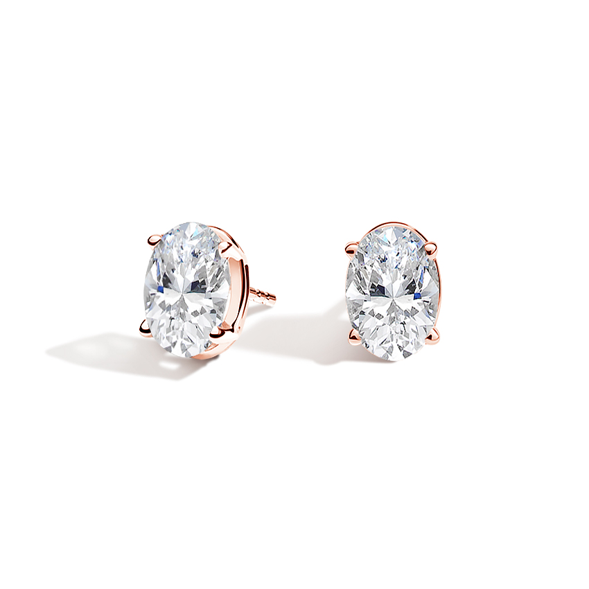 Four-prong Oval Diamond Stud Earrings in 18K Yellow Gold